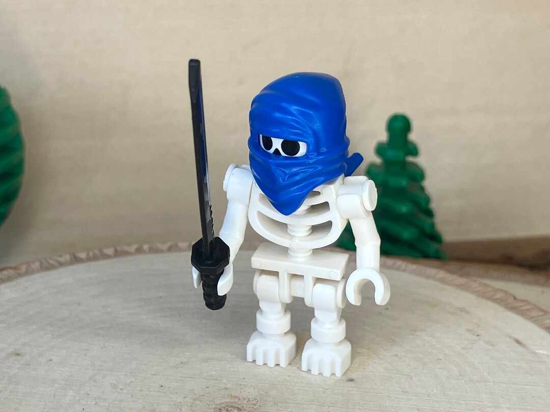 Skeleton Ninja Wearing a Blue Ninja Wrap Holding a Katana Sword Genuine ...