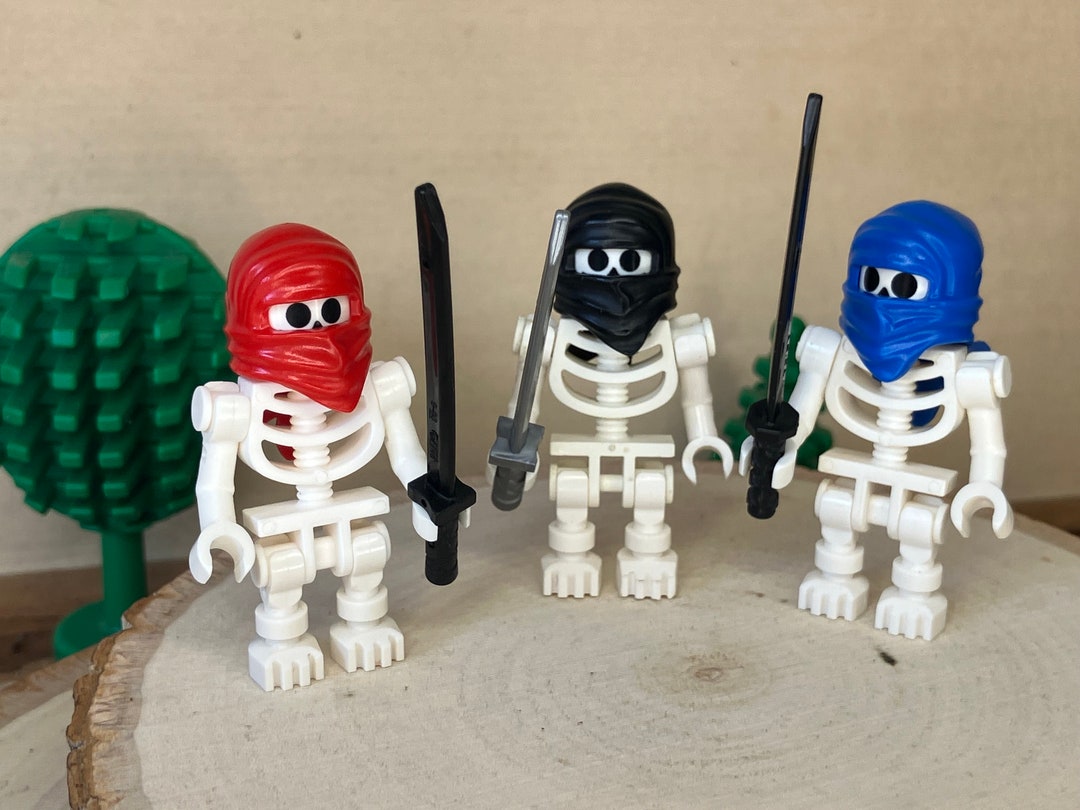 Skeleton Ninja Clan of Three Wearing a Black, Blue and Red Ninja Wraps ...