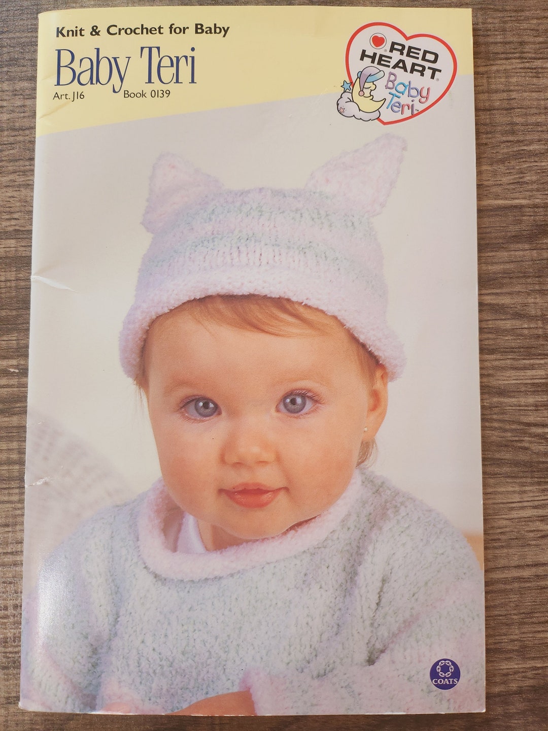 Knit & Crochet Baby Outfit Patterns: Red Heart Sweater, Dress, Bunting ...