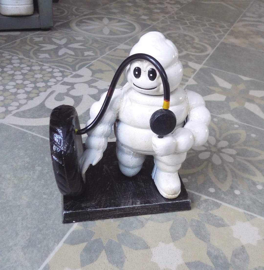 MICHELIN MAN " Inflating a Tyre " Heavy Cast Iron Ornament Door Stop - Etsy
