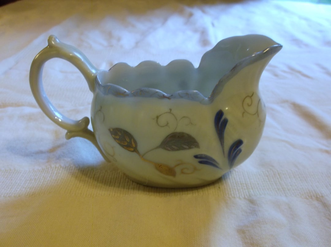 Vintage Yellow Glazed Porcelin Creamer With Blue and Gold Leaf Pattern ...