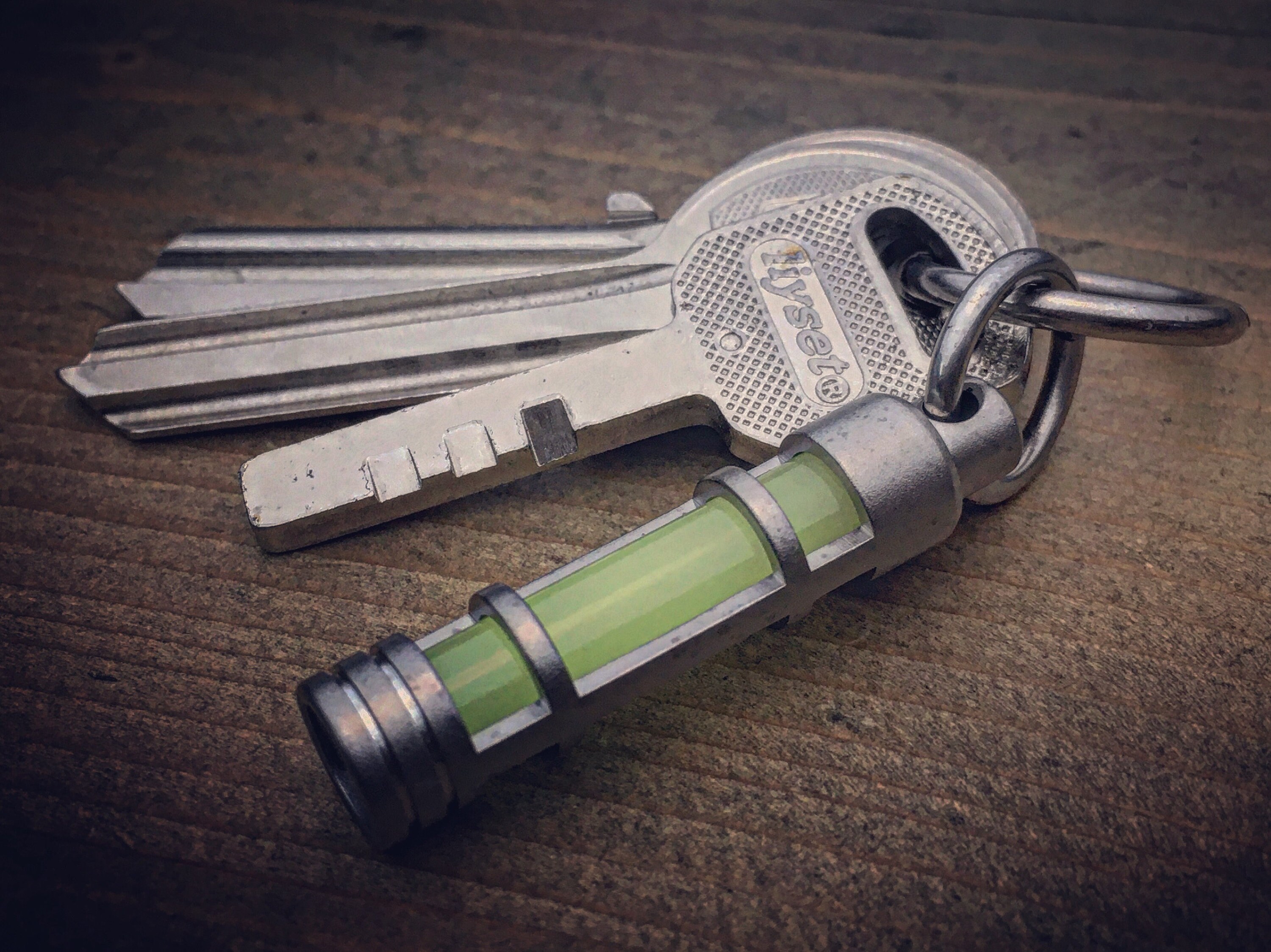 Glow-Fob Pendant Lamp Locator in stainless steel cage