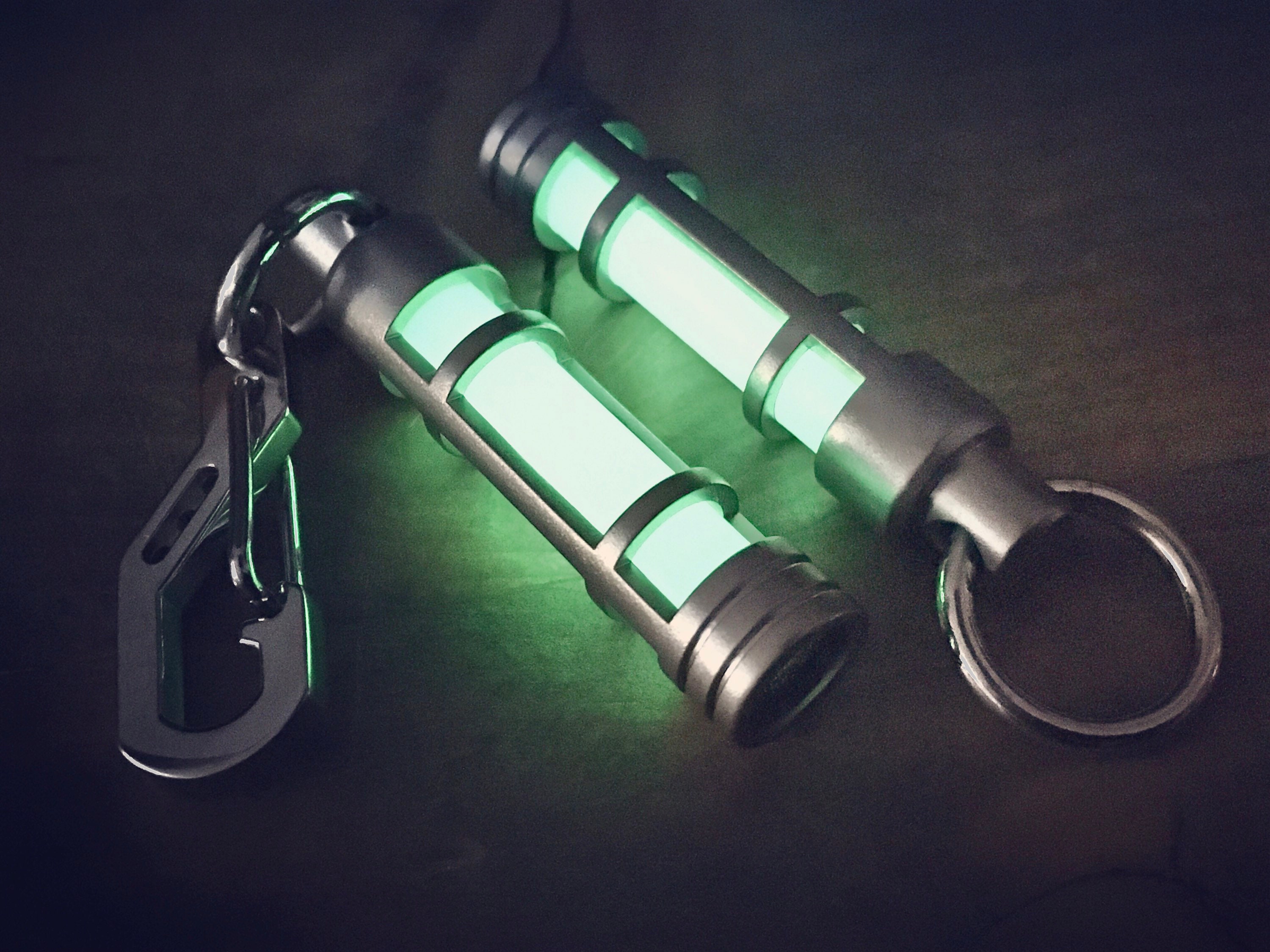 Glow-Fob Pendant Lamp Locator in stainless steel cage