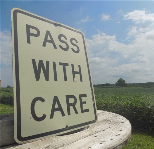 Pass With Care Sign