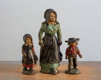 Iron amish figurines | Etsy