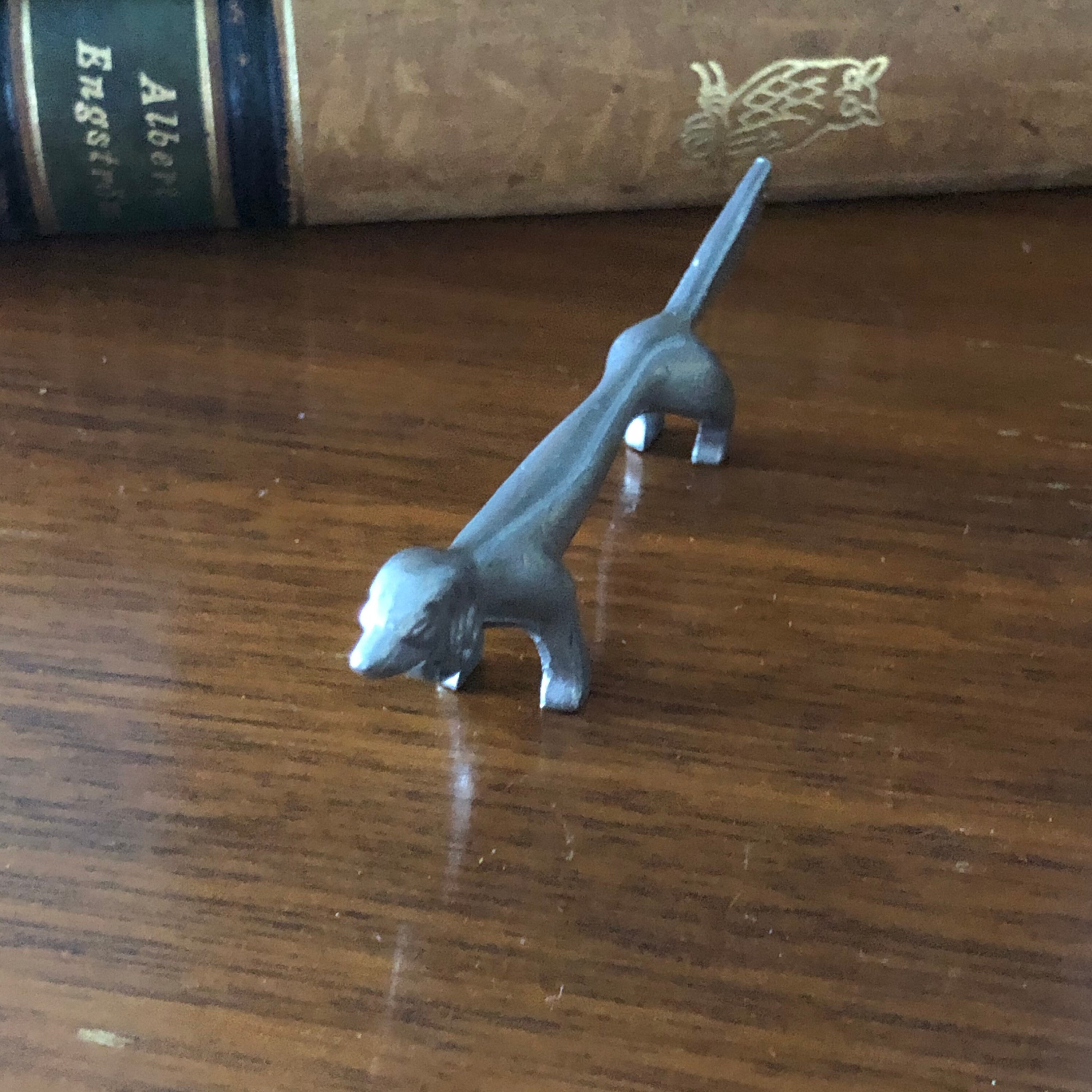 Miniature Vintage butter knife rest Swedish pewter dachshund figurine ...