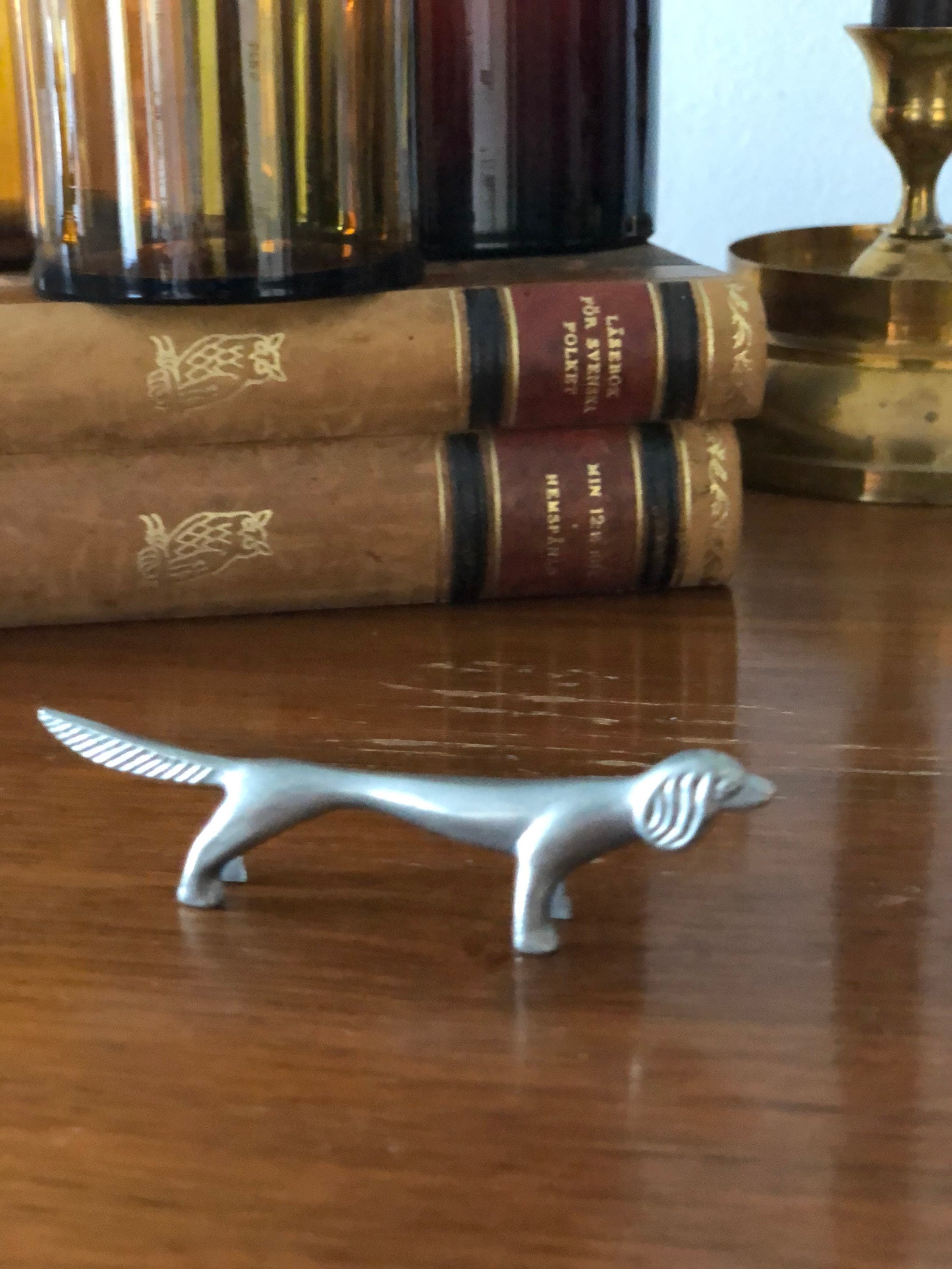 Miniature Vintage butter knife rest Swedish pewter dachshund figurine ...