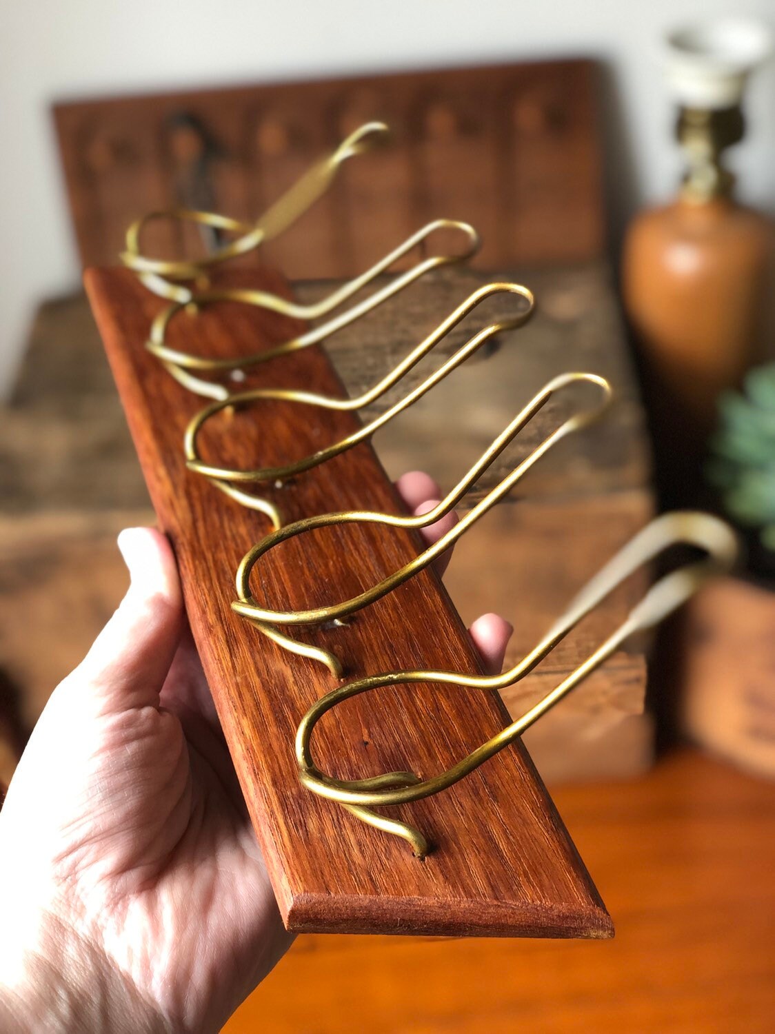 Scandinavian teak and bronze pipe holder mid century modern 1960s