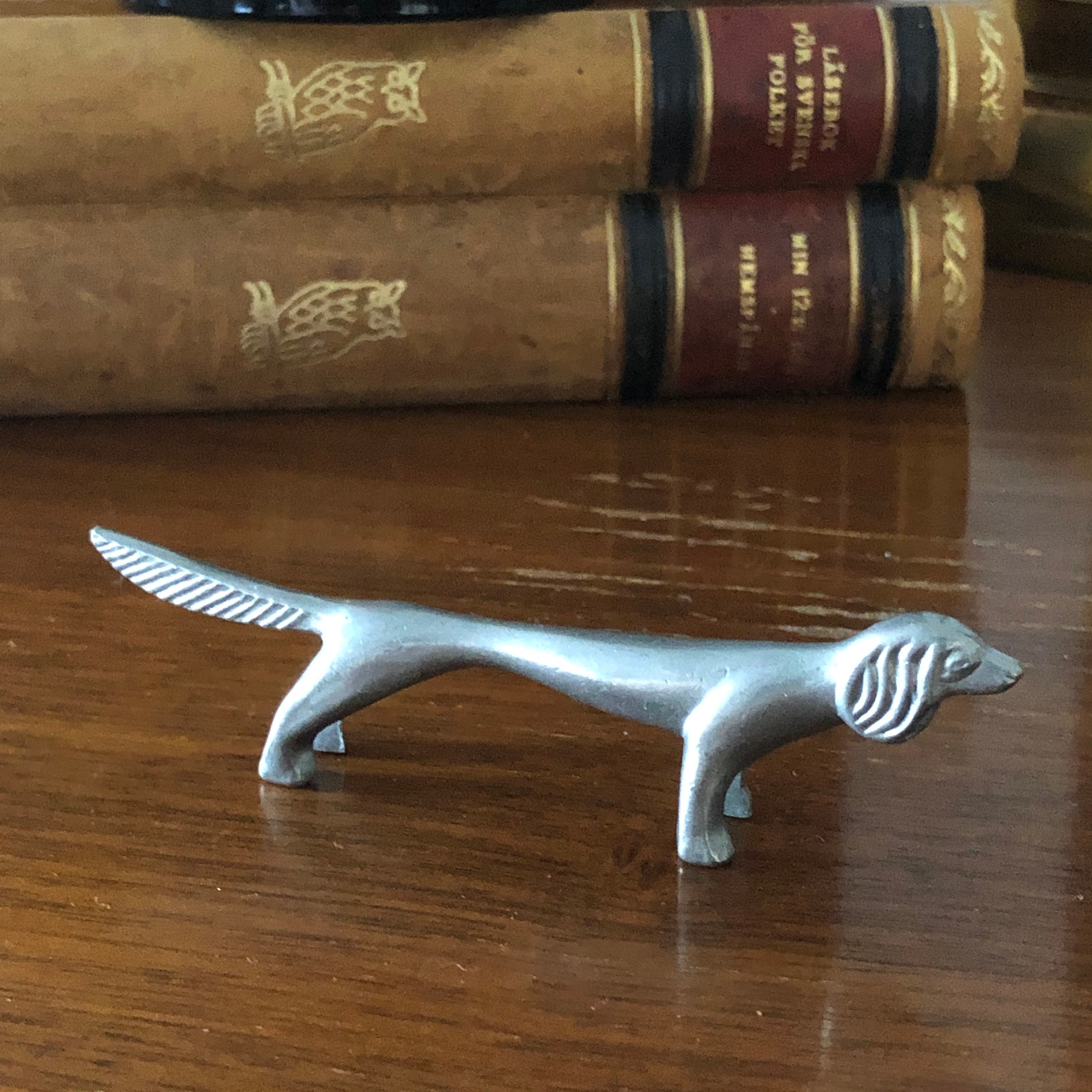Miniature Vintage butter knife rest Swedish pewter dachshund figurine ...