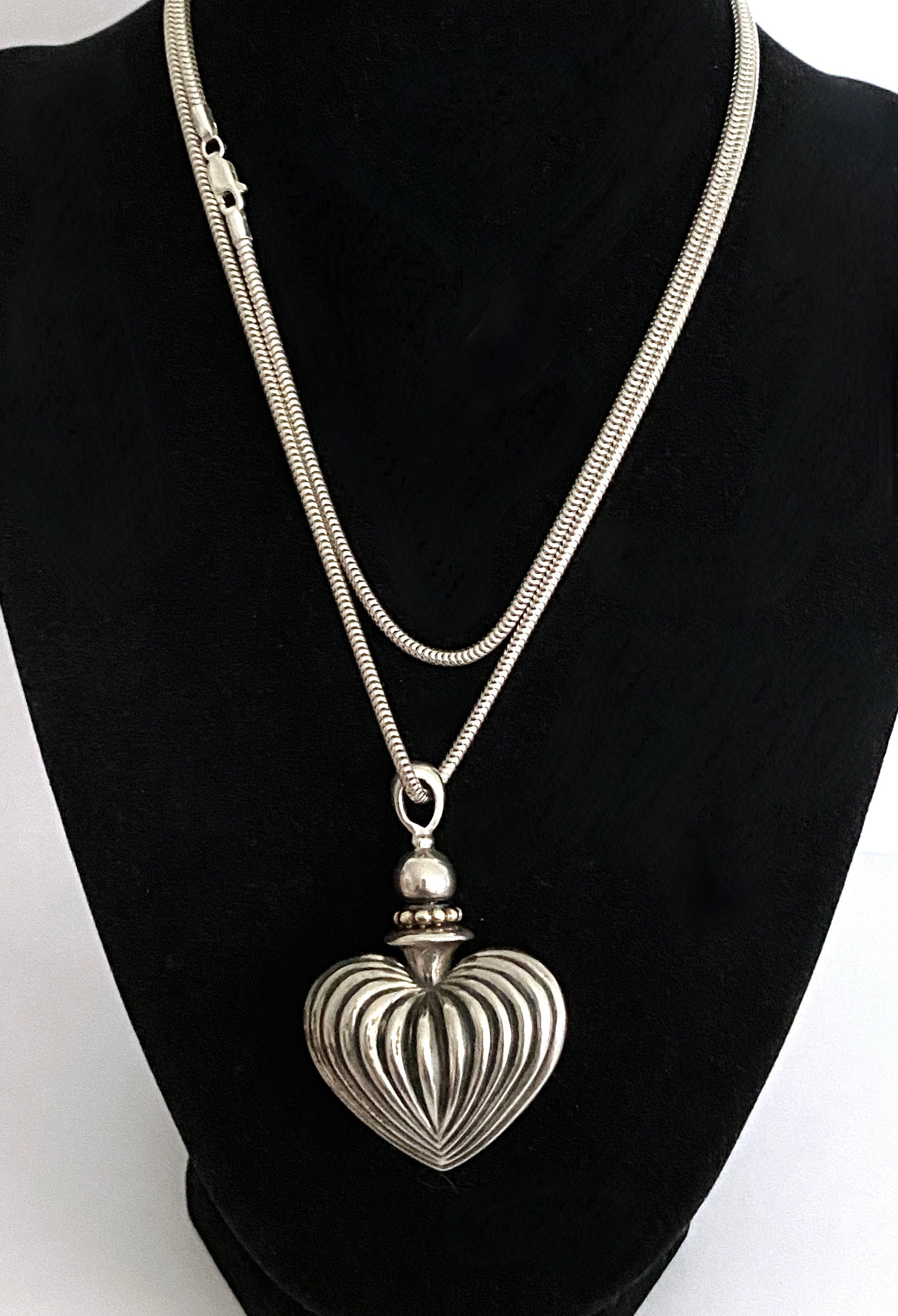 Vintage Lagos Caviar Collection Sterling 18K Dual Wear Fluted Heart Perfume Pendant W two Different Tops 30 Silver Snake Chain 60 Grams Etsy Ireland