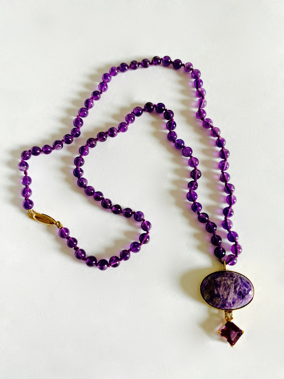 Custom Artisan Amethyst Hand Knotted Beads With Bezel Set Oval Charoit ...
