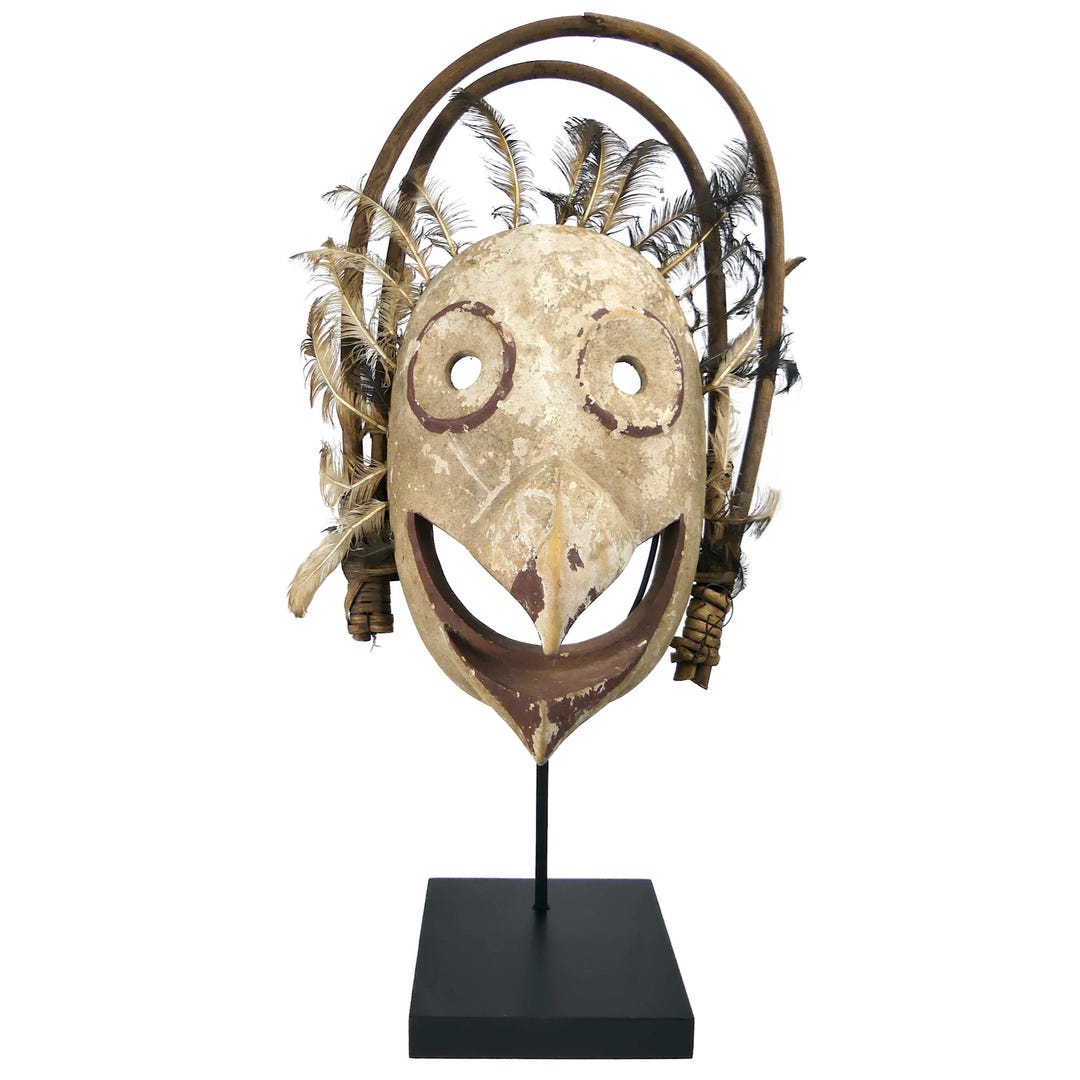Large Cephalomorphic Bird Spirit Mask on Metal Stand and Black Wood ...
