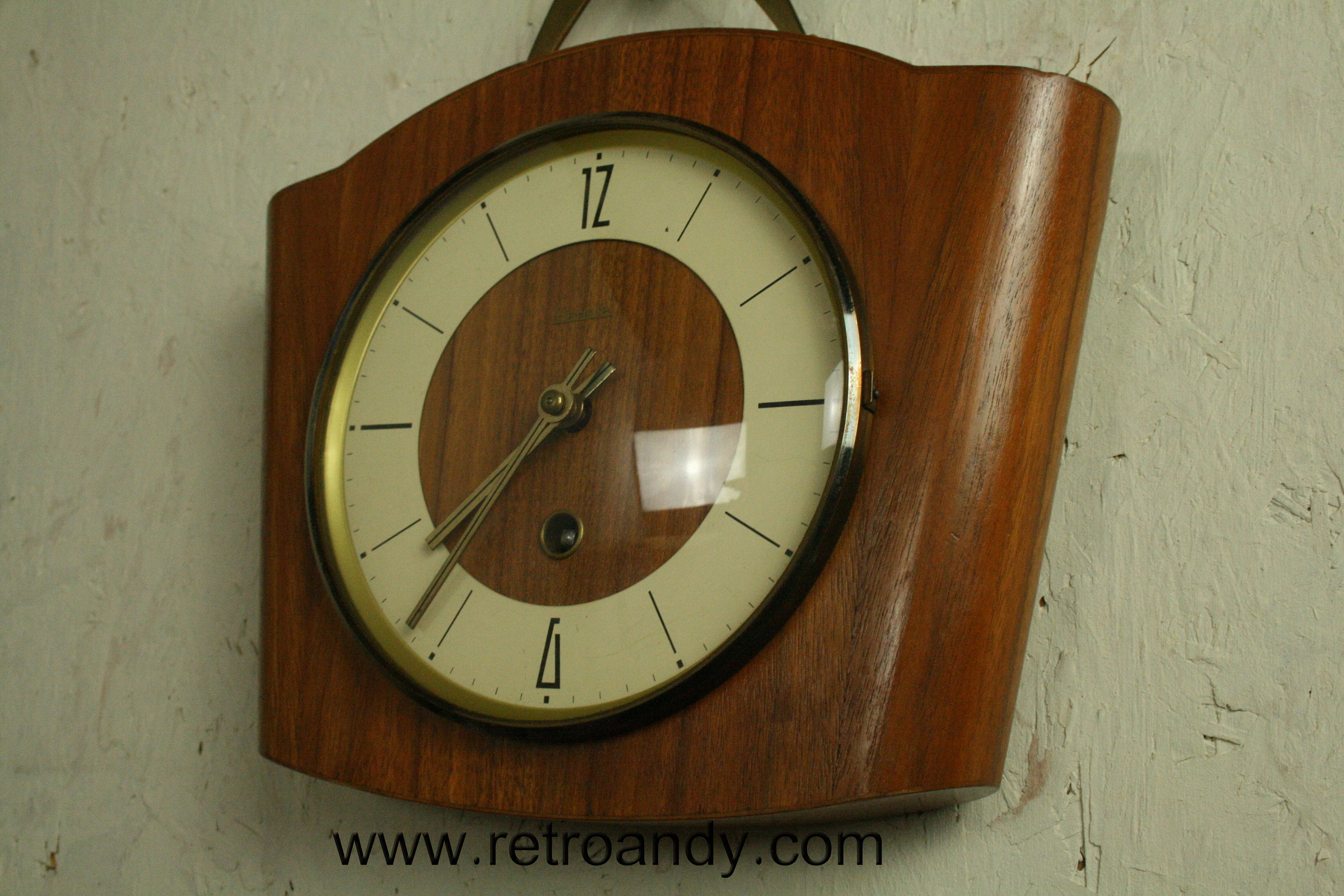 vintage 50s teak and brass mechanical wall clock