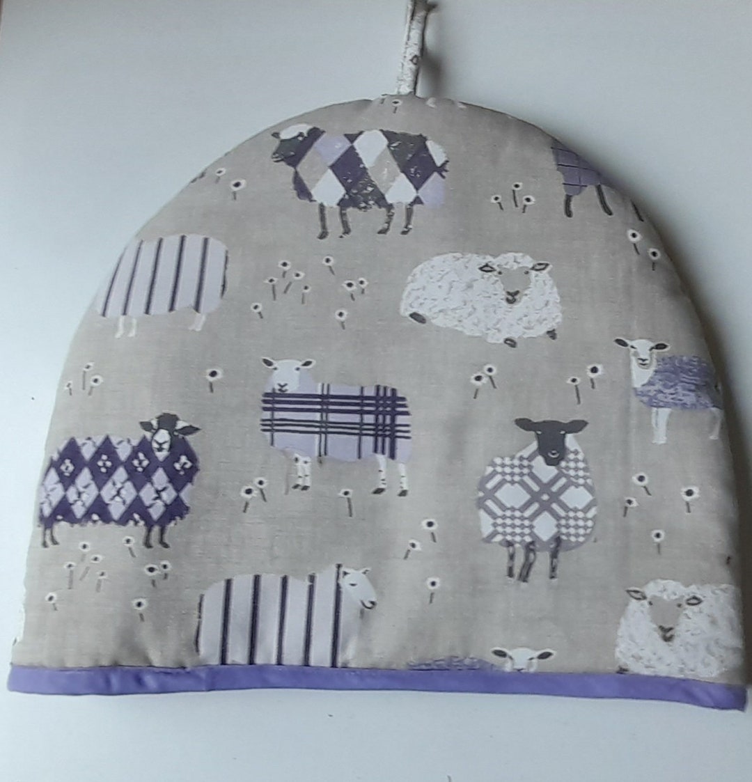 A Stylish Padded Tea Cosy in Organic Cotton in a Mauve Comedy Sheep ...