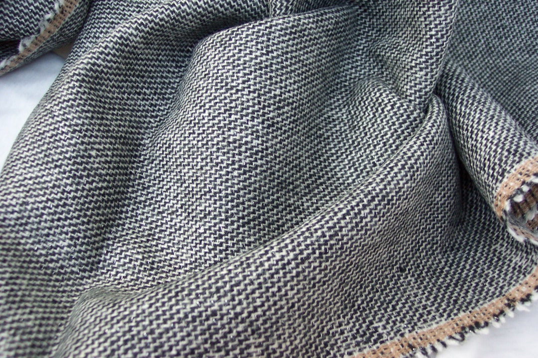 Black, White and Gray Tweed Fabric With a Silver Metalic Thread Running ...