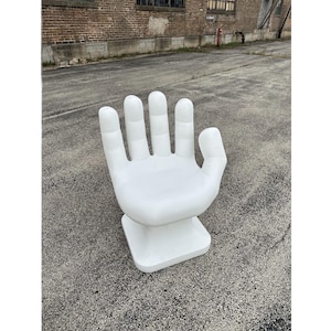 White hand shaped chair store