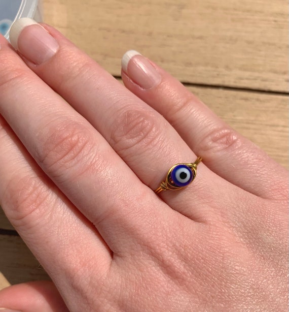 Evil eye glass ring store