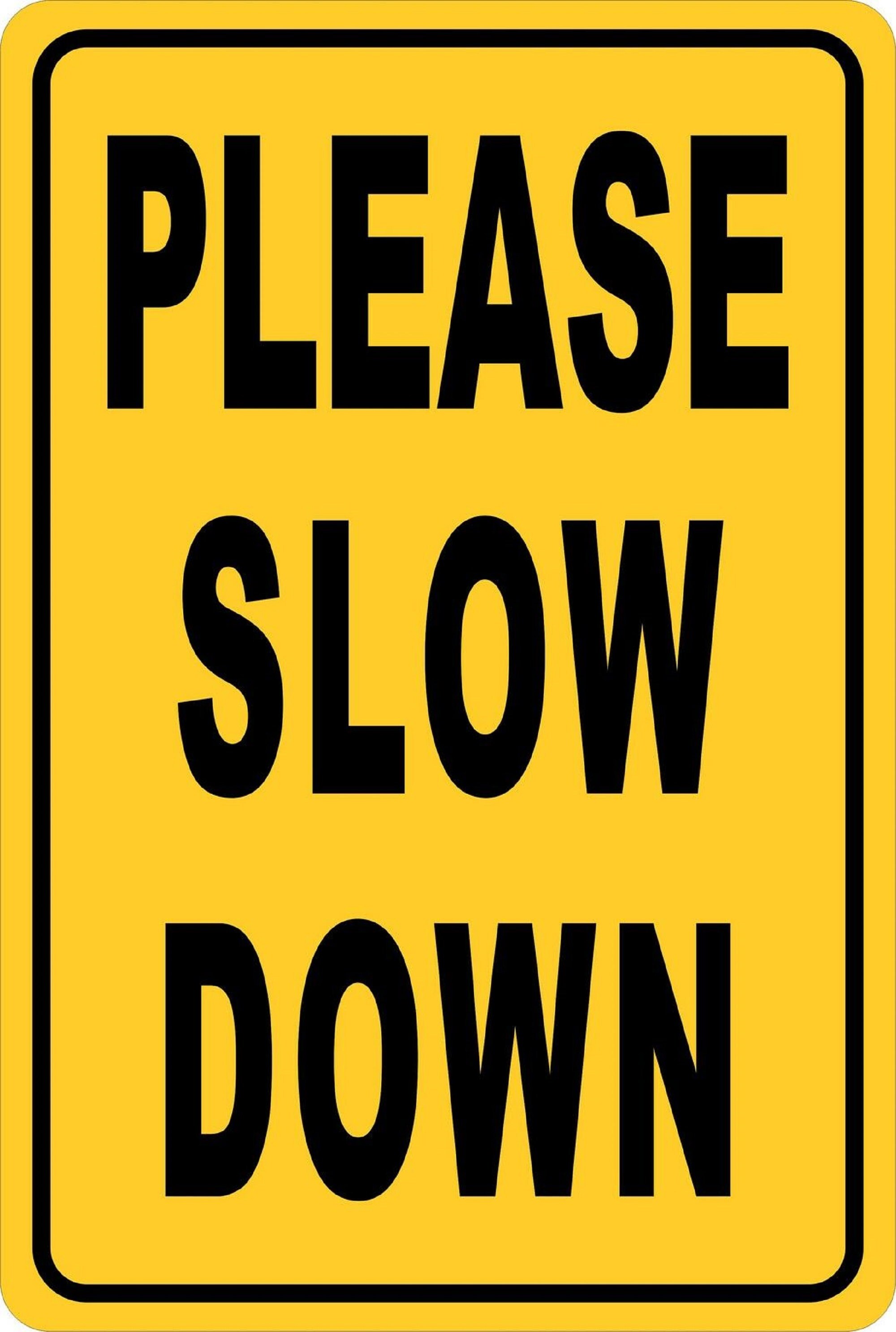 Yellow Slow Sign