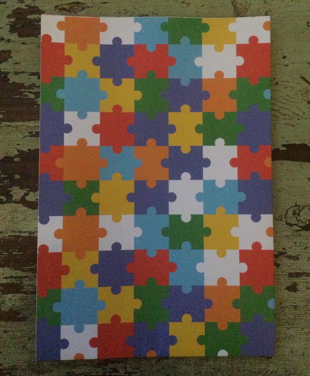 Colorful Jigsaw Puzzle Wrapping Paper. Puzzle Piece Folded Wrapping ...