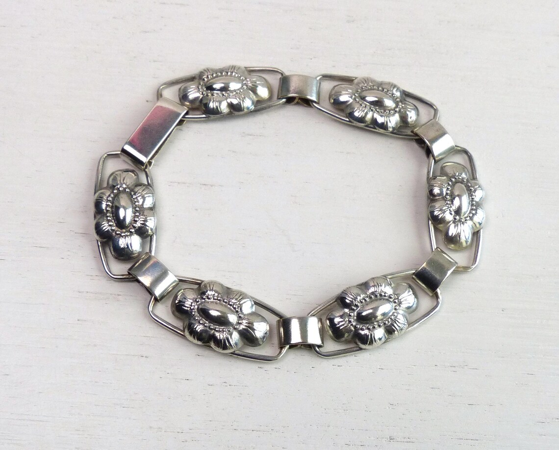 Pulseira vintage Hugo Grun Suécia em prata de lei com painel floral ...