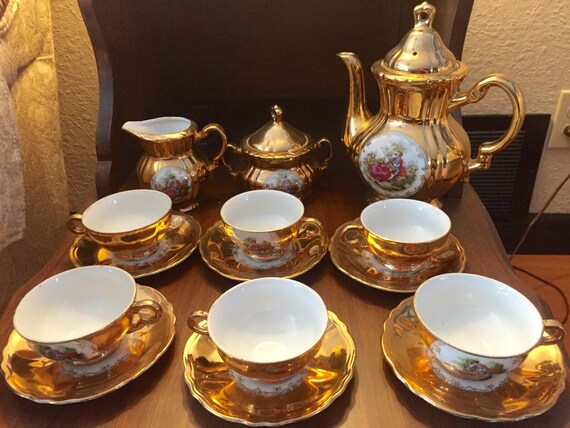 Items similar to Vintage All Gold painted 9 piece tea set! on Etsy
