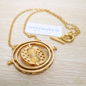 Gold Sand Timer Hour Glass Hourglass Necklace Time Turner Turn Style ...