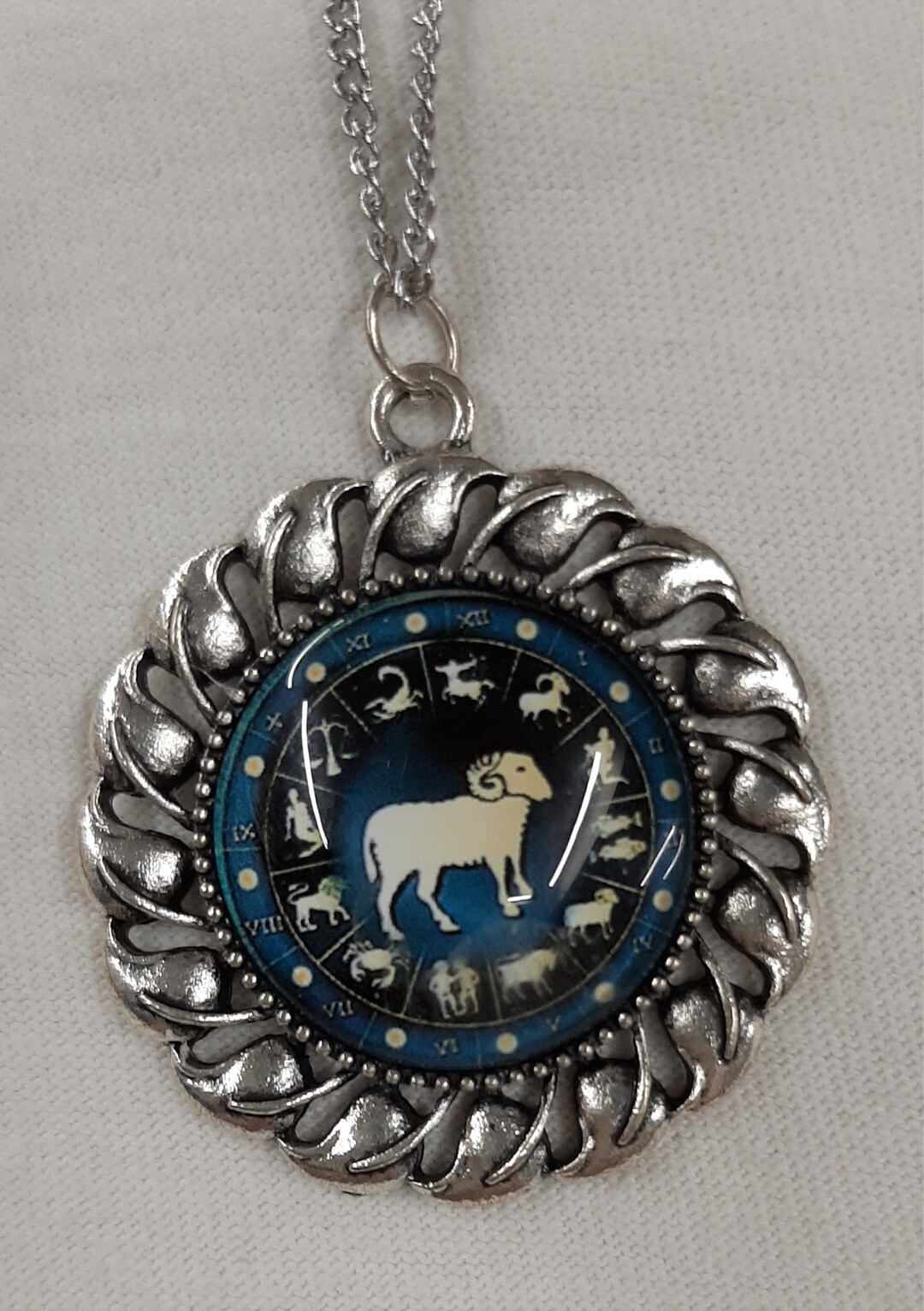 Handsome Round Swirled Leaf Rim Blue & White Aries Ram Zodiac Cameo ...