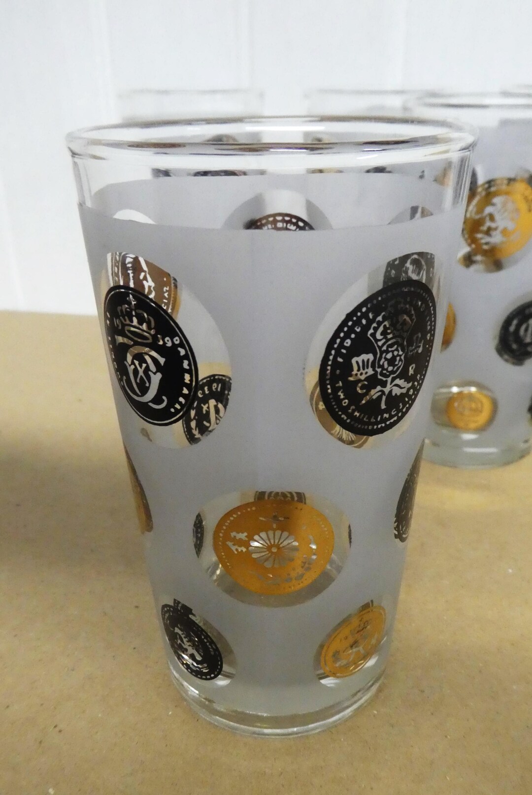 MCM Black and Gold World Coin Frosted Tall Glasses Set of 7 Libbey ...