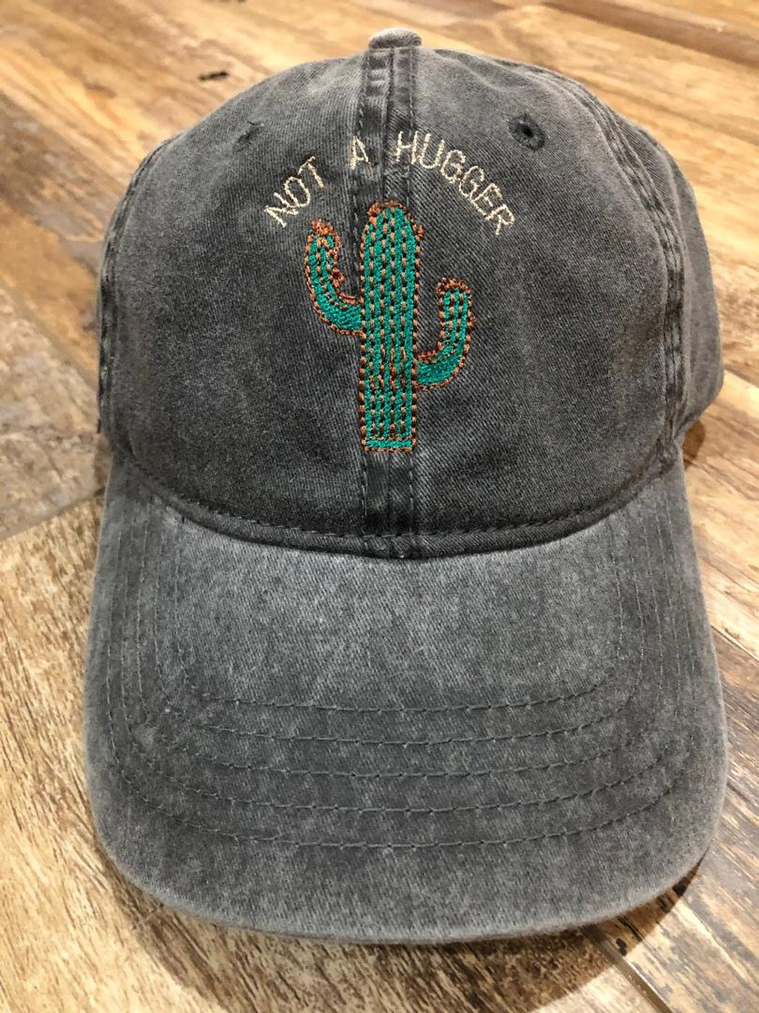 Not a Hugger Base Ball Cap - Snarky Hat - Ladies Fit Buttercup Baseball ...