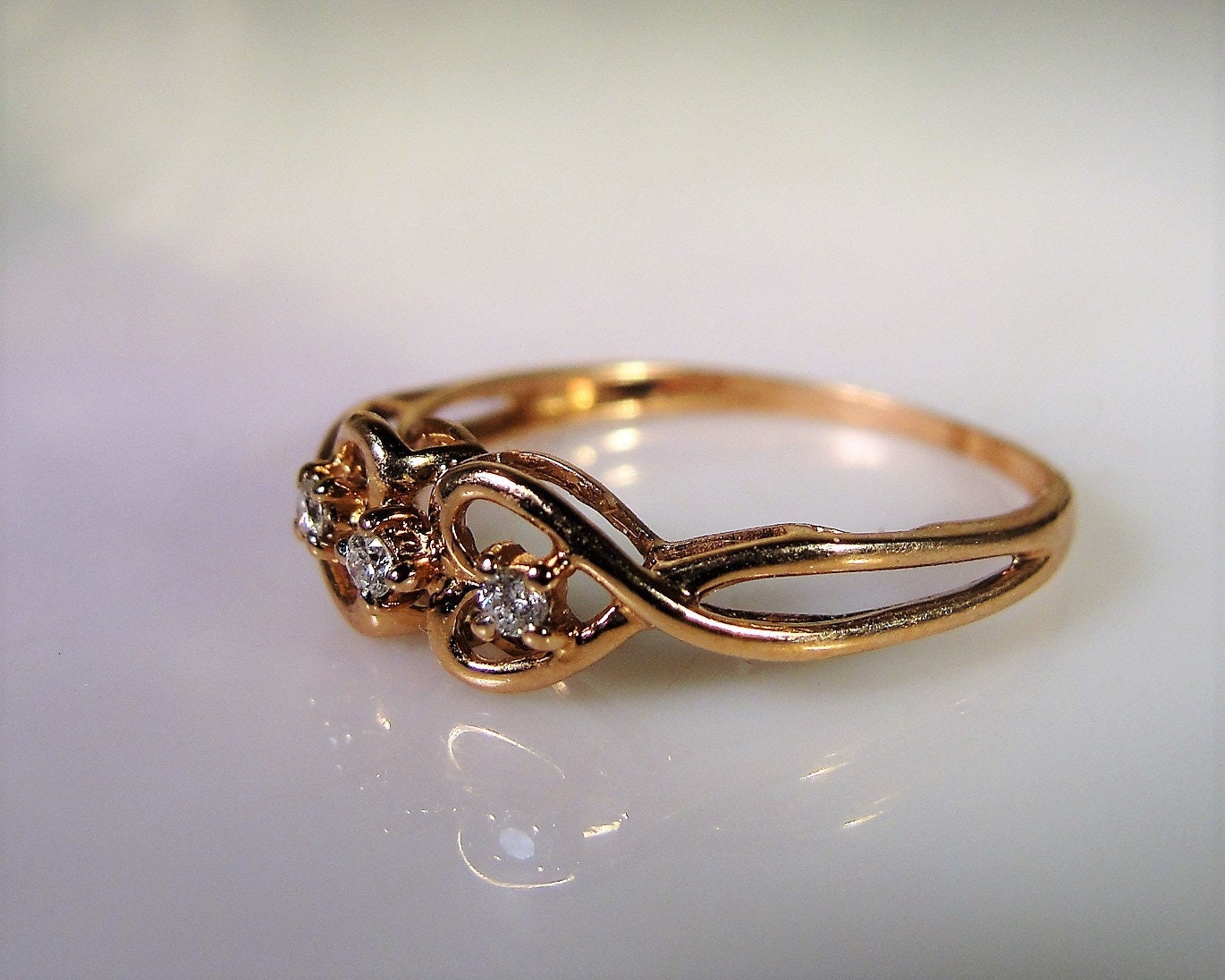 14K Rose Gold Three Diamond Intertwining Hearts Ring, Trilogy Ring ...