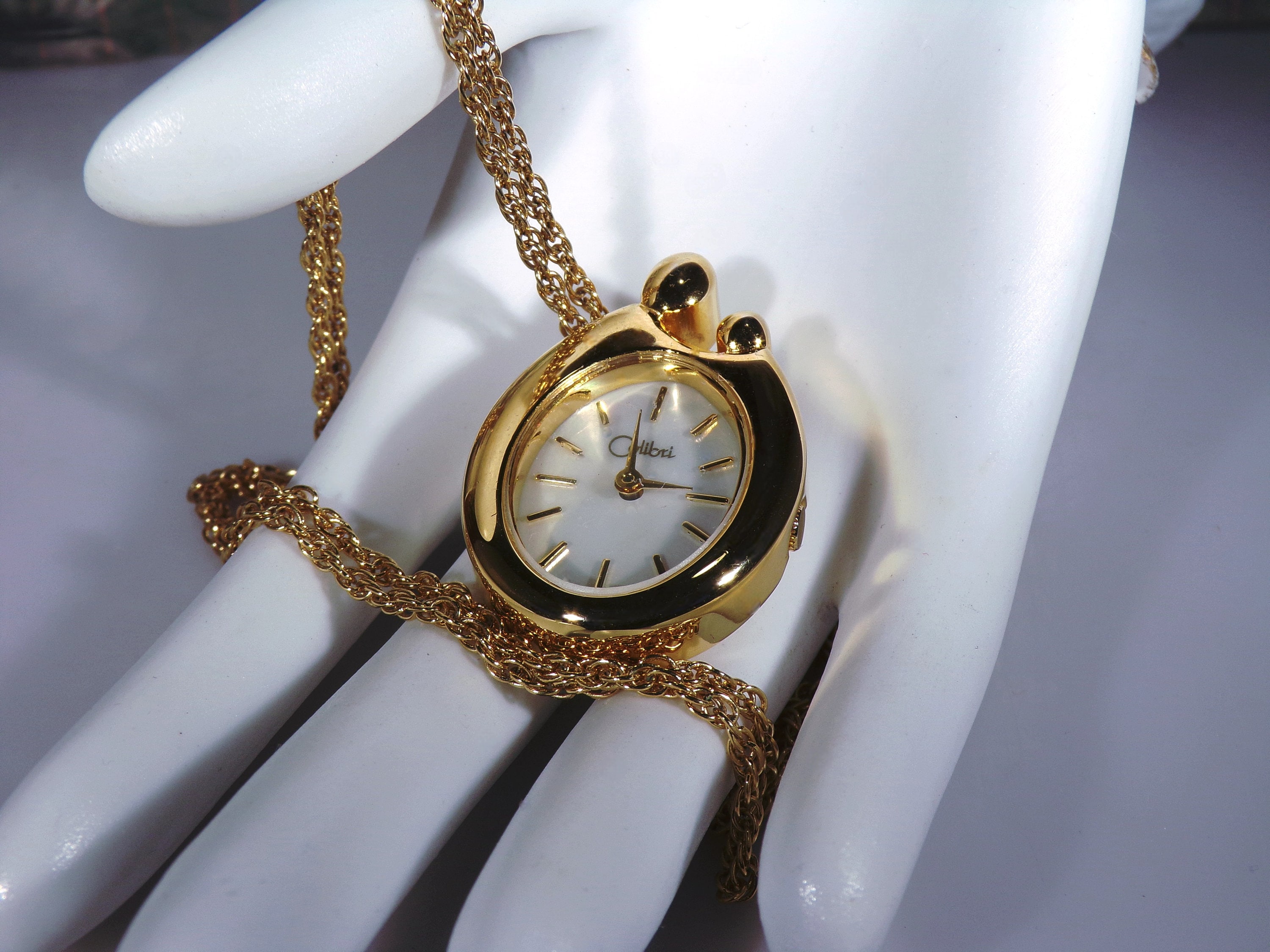 COLIBRI Stunning Jonel Russell’s Mother and Child Watch Pendant, 24 ...