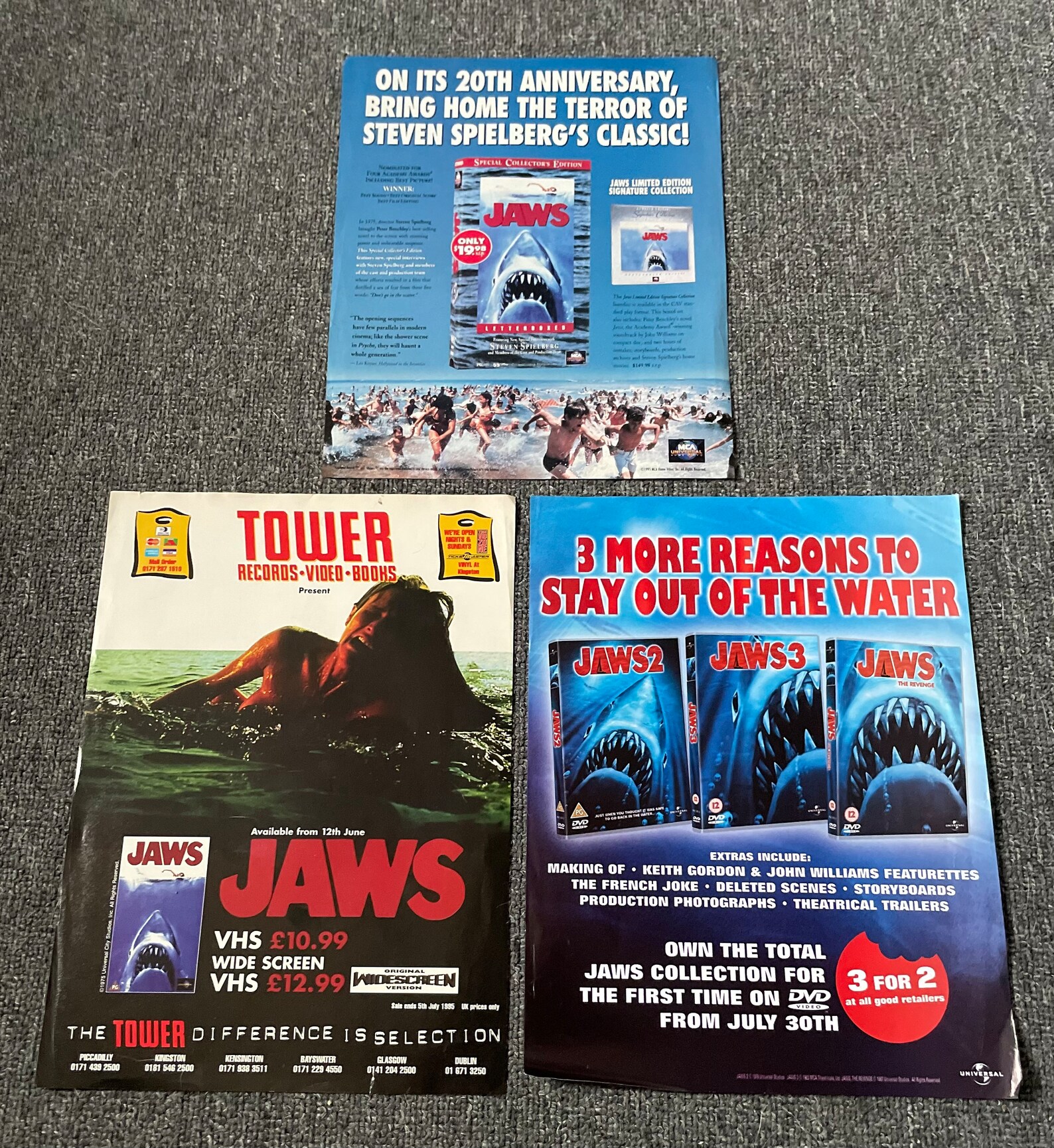 Three JAWS VHS DVD Magazine Page Ads Laser Disc Tower Records Sequels ...