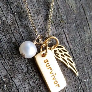 Gold Survivor Necklace, Gold Tag Survivor Charm, Gold Angel Wing Charm ...