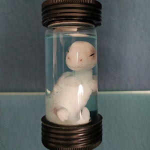 White Little Baby Dragon Fetus in Jar Foetus Test Tube Experiment ...