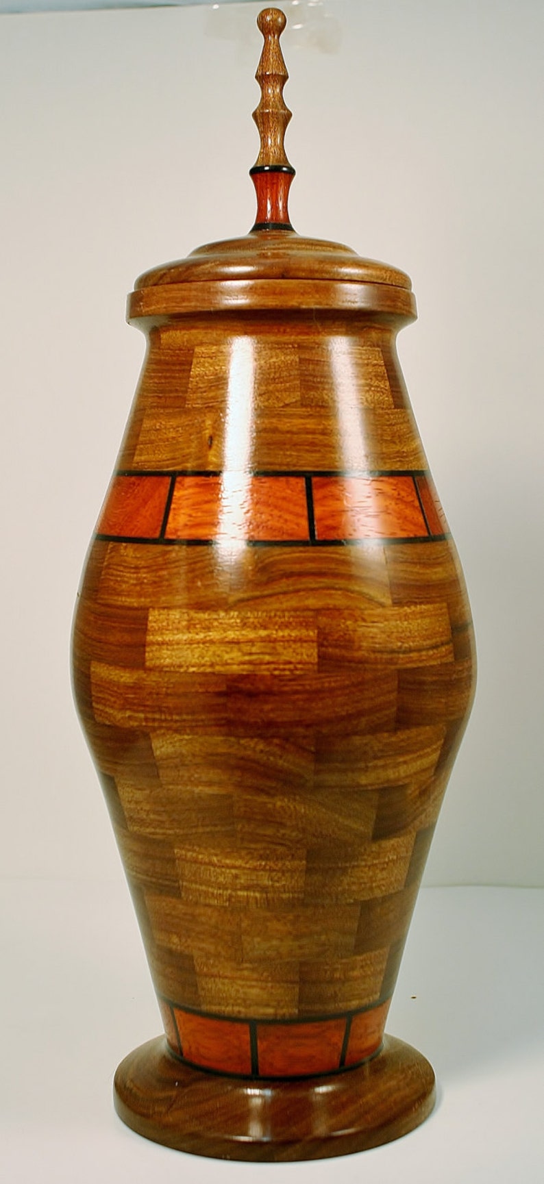 This Hand Crafted Segmented Urn is Made With Chechen,paduak,gaboon ...
