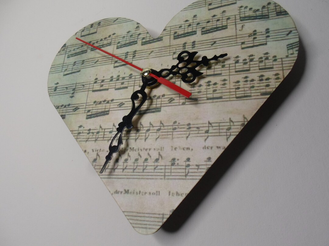 Heart Shaped Wall Clock With a Printed Old Copy of Sheet Music on Face ...