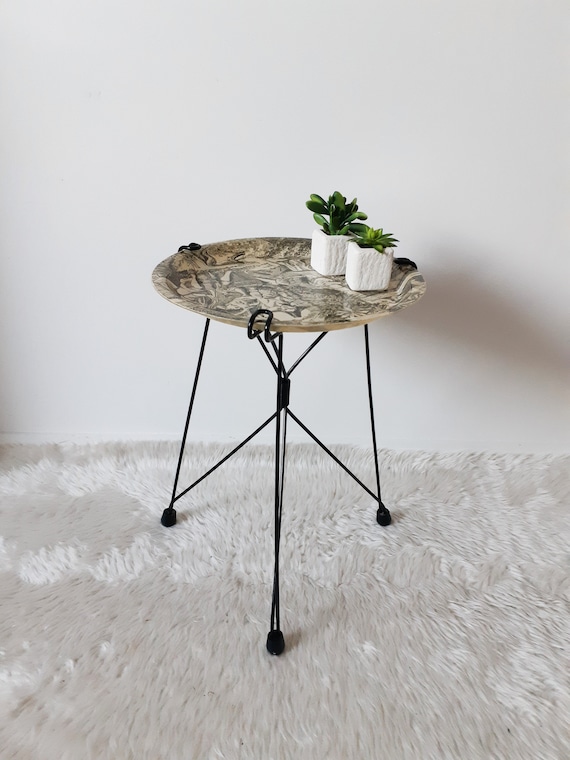 Small tripod table store