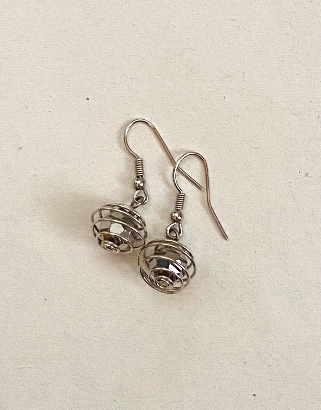 USA Spiral Wire Caged Faceted Bead Earrings - Etsy UK
