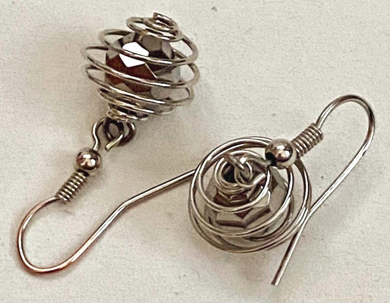 USA Spiral Wire Caged Faceted Bead Earrings - Etsy UK
