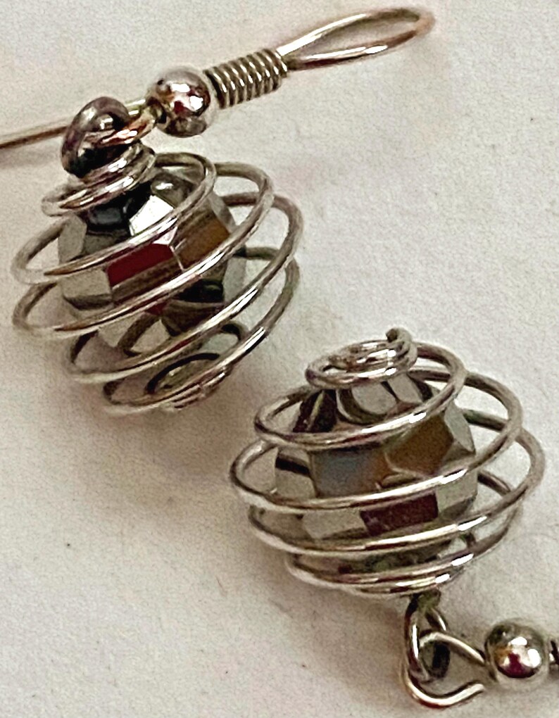 USA Spiral Wire Caged Faceted Bead Earrings - Etsy UK
