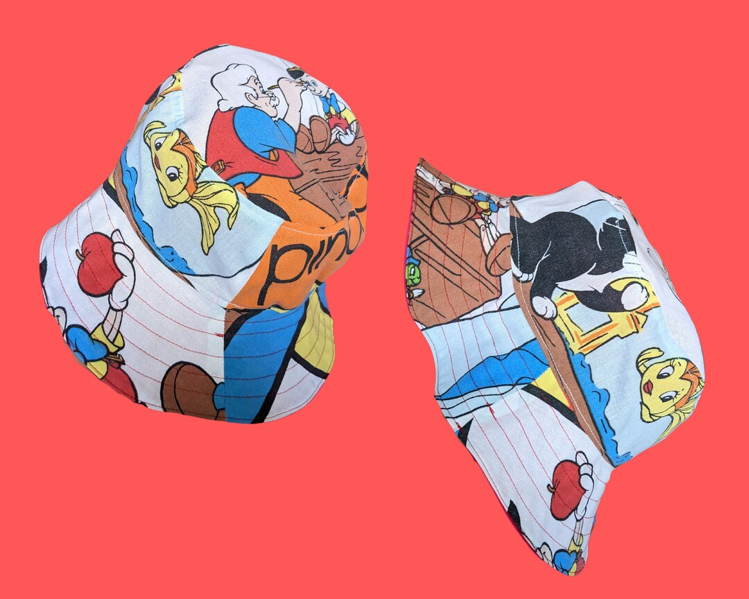 Walt Disney's Pinocchio Reversible Bucket Hats for Adults Made From ...