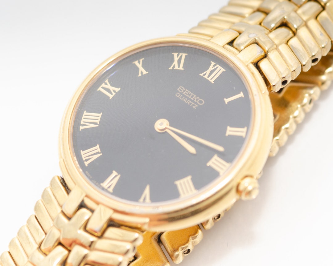 Vintage Seiko 7N00-F070 Gold Tone Black Dial Quartz Watch - Etsy