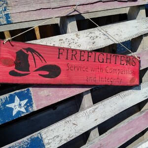 Firefighters, Service With Compassion and Integrity Sign. Fire Fighters ...