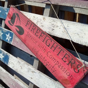 Firefighters, Service With Compassion and Integrity Sign. Fire Fighters ...