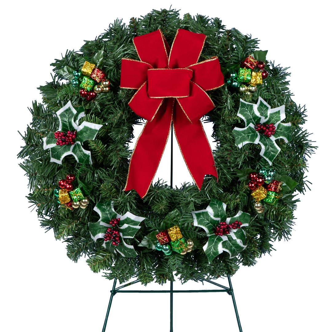 Holiday Ornaments With Red Velvet Bow Christmas Wreath On Easel