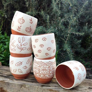 Handmade Brown Clay Cups With Botanical Carvings | White and Brown ...
