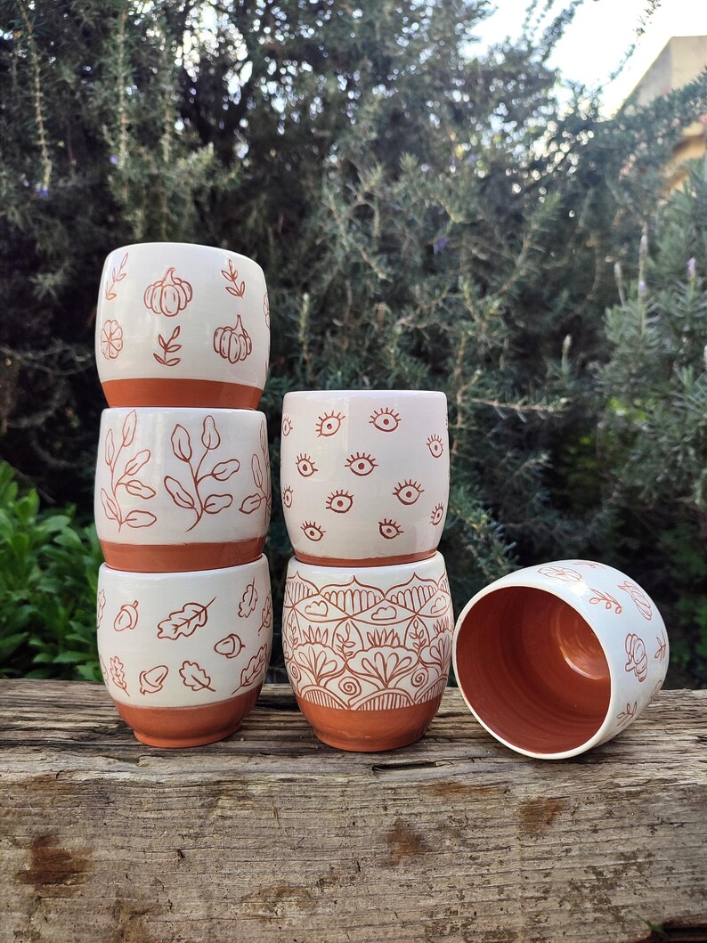 Handmade Brown Clay Cups With Botanical Carvings | White and Brown ...