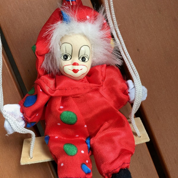 Porcelain Clown on Swing - Etsy