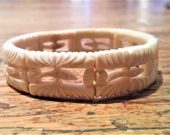 Carved bone bracelet | Etsy