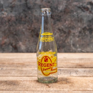 Vintage Regent Supreme Beverages 7oz Bottle ACL Glass Bottle Red Yellow ...